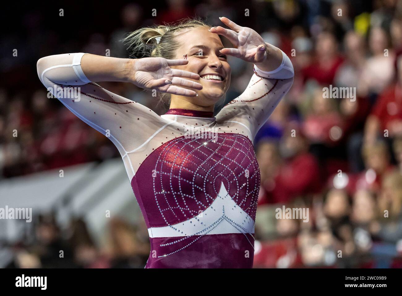 Alabama gymnast Rachel Rybicki celebrates after her 9.800 on the beam ...