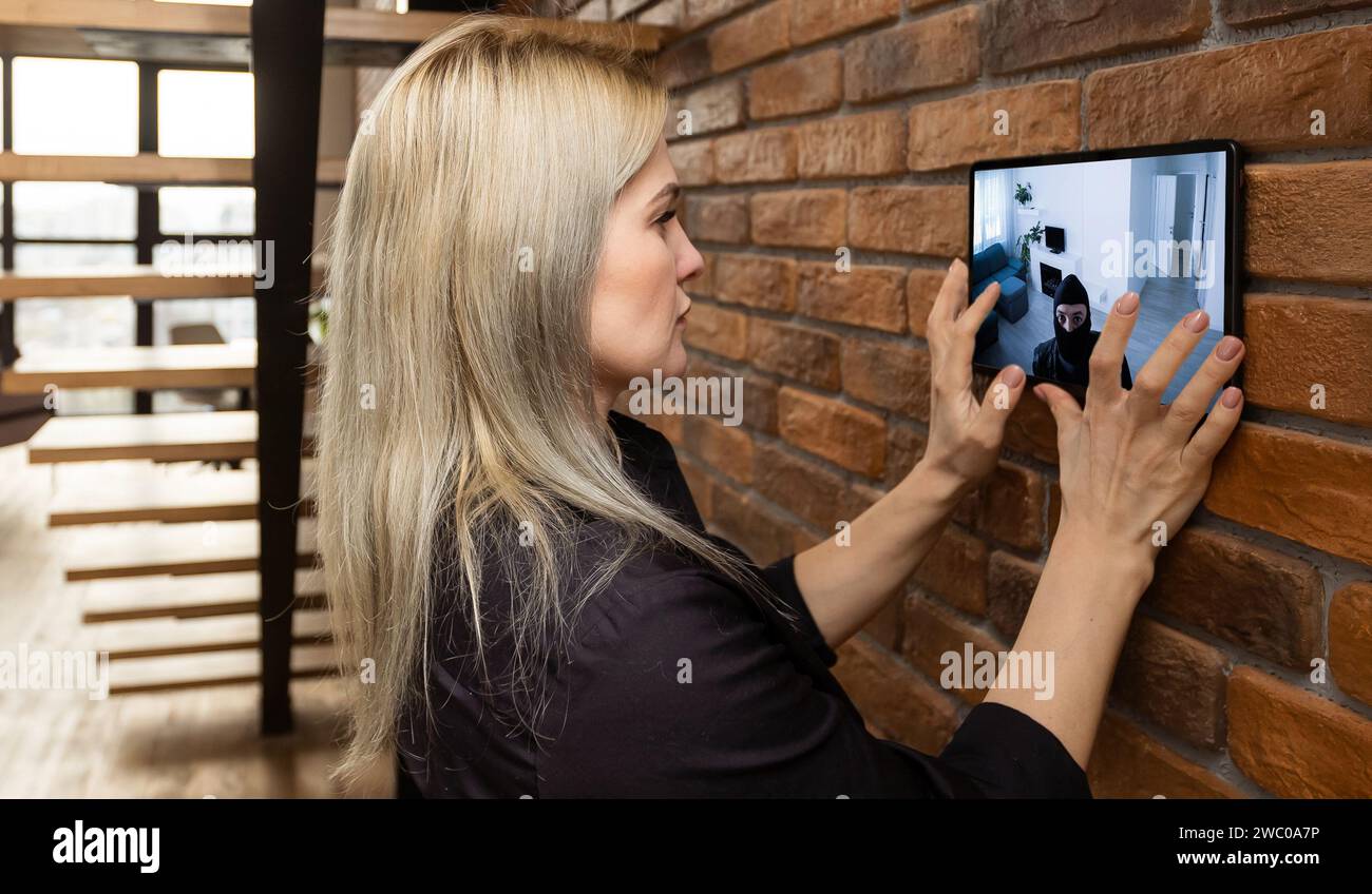 tablet with view from CCTV cameras. Home security system Stock Photo ...