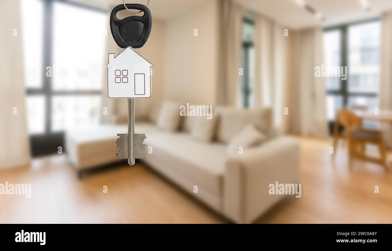 Open door with keys, key in keyhole Stock Photo - Alamy