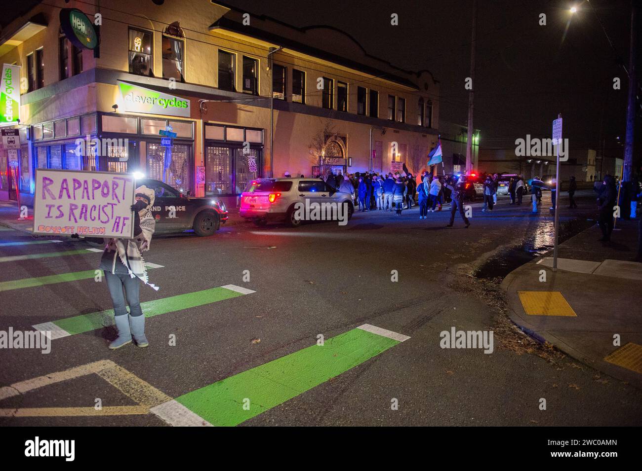 Portland, Oregon, USA. 12th Jan, 2024. Portland Police hold a line in ...