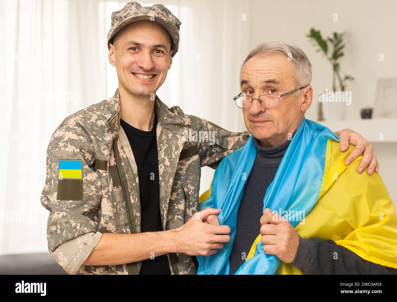 Ukrainian military man with his father Stock Photo - Alamy
