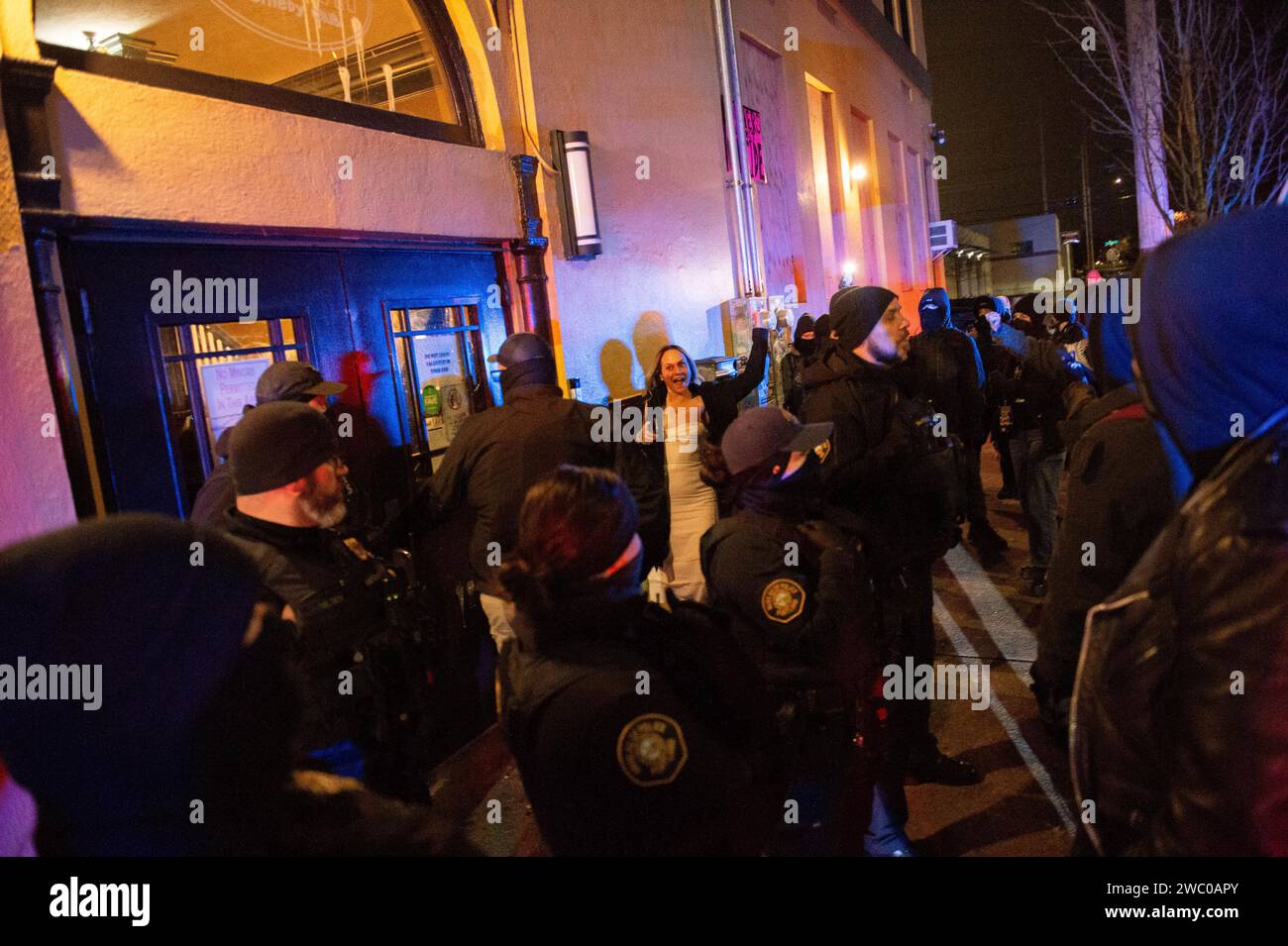 Portland, Oregon, USA. 12th Jan, 2024. A ticket holder gives pro ...