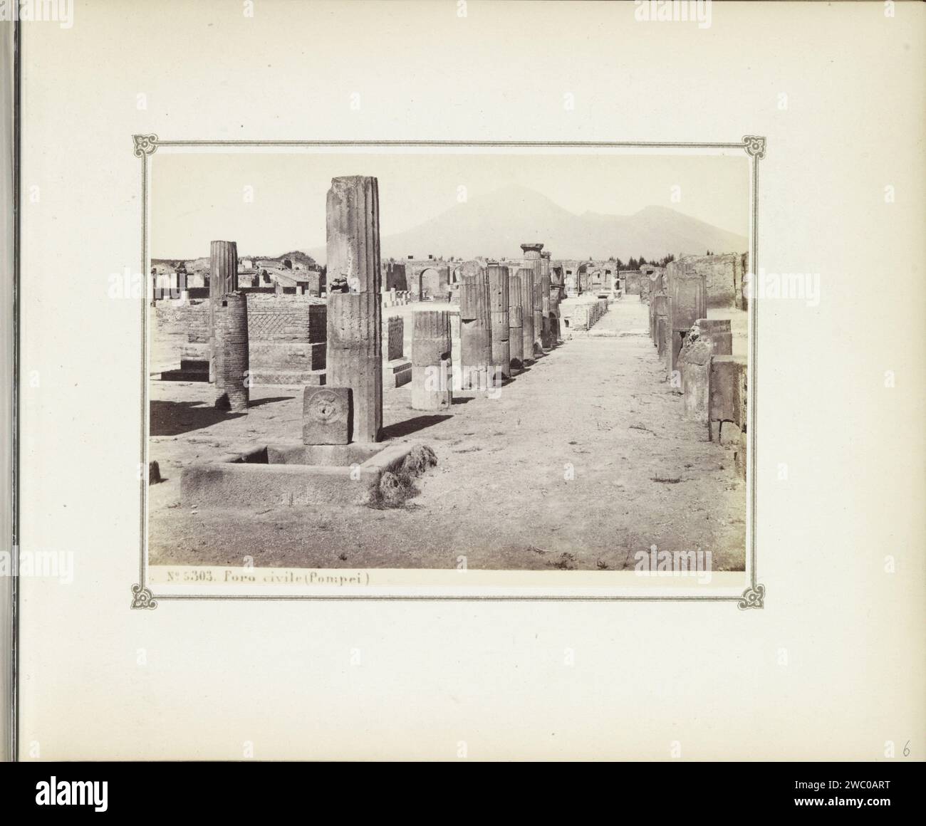 View of remnants of the forum in Pompeii with the Vesuvius in the ...
