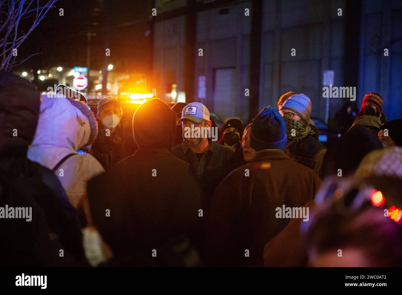 Portland, Oregon, USA. 12th Jan, 2024. A ticket holder faces activists ...