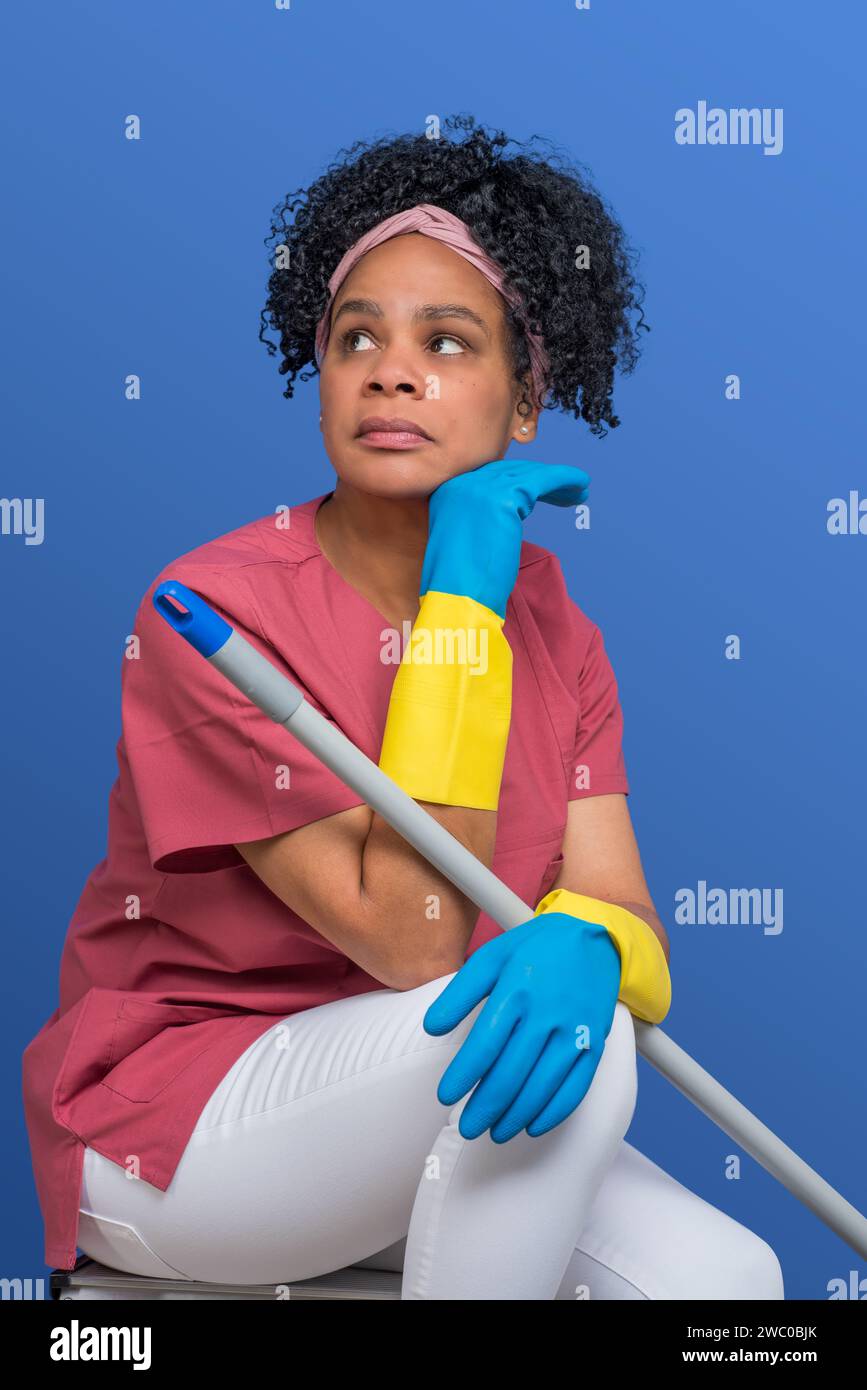 Hands wearing yellow gloves cleaning hi-res stock photography and ...