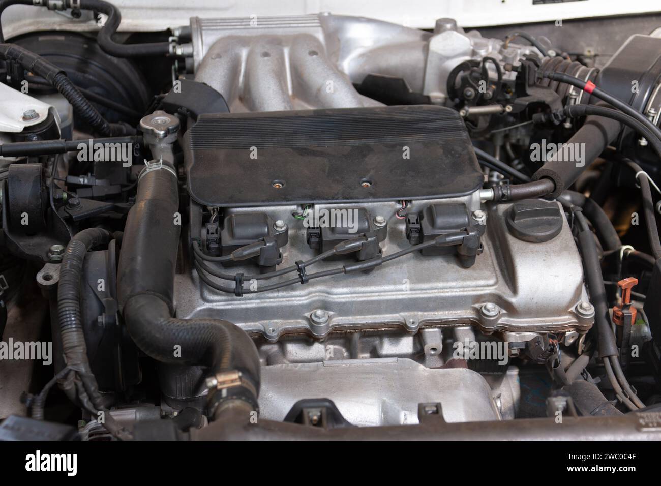 car engine under the hood, top view, six cylinders in V formation Stock ...