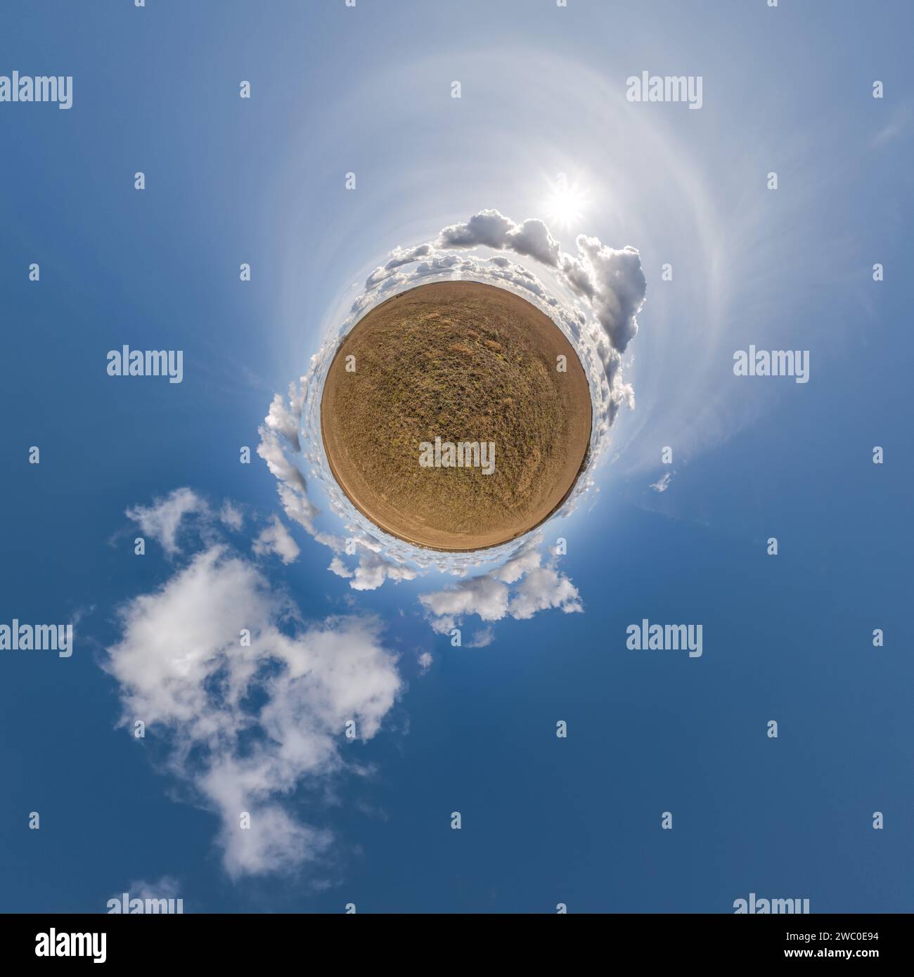 simple tiny planet without buildings in blue sky with beautiful clouds ...