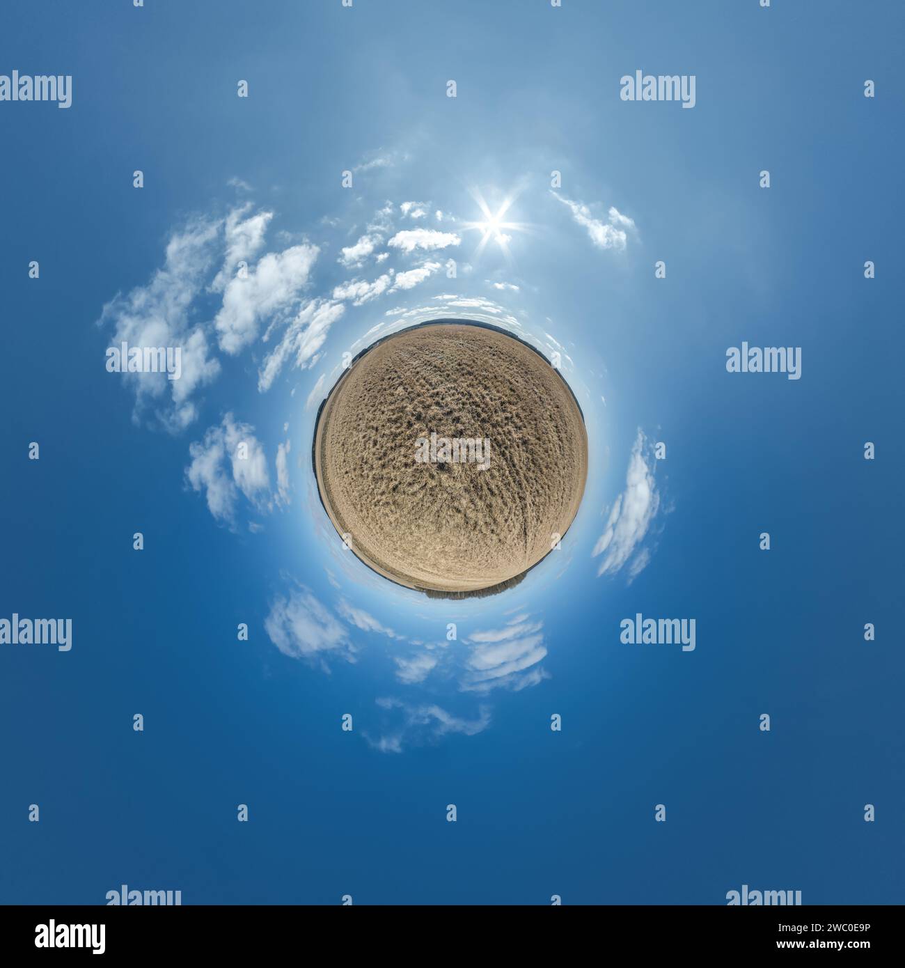 simple tiny planet without buildings in blue sky with beautiful clouds ...