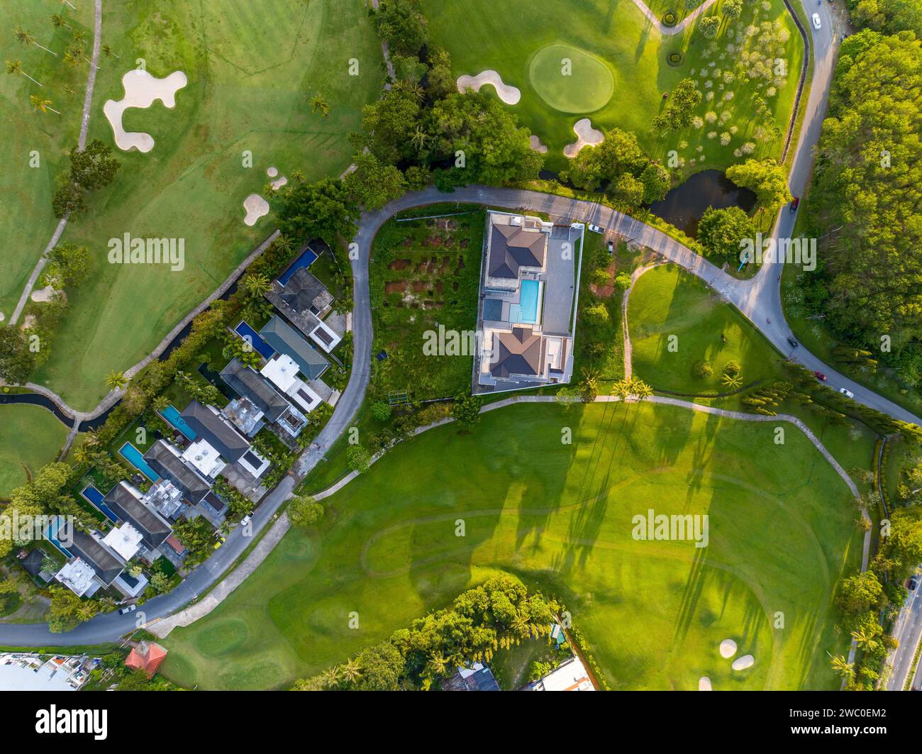Aerial view of beautiful green golf field fairway and putting green ...
