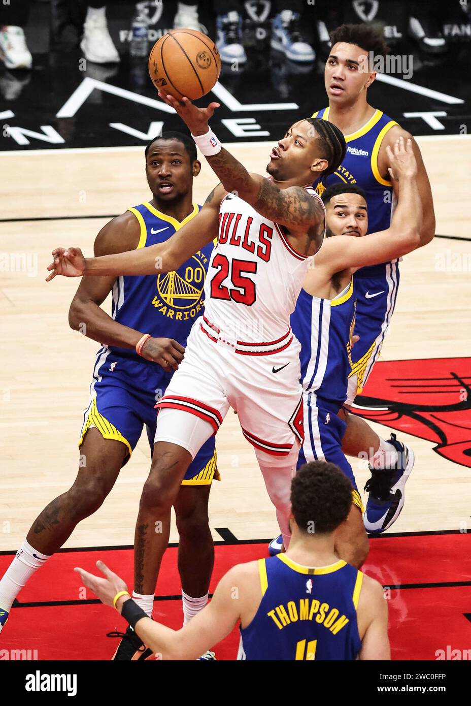 Chicago, USA. 12th Jan, 2024. Chicago Bulls forward Dalen Terry (2nd L ...