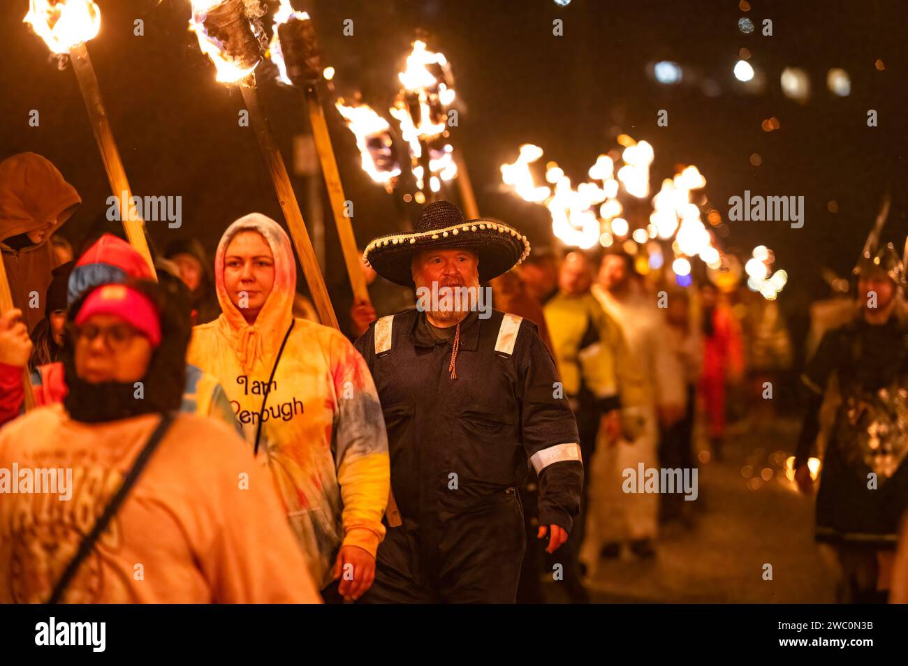 Guizer Jarl John Robert leads his squad with torches aflame through ...
