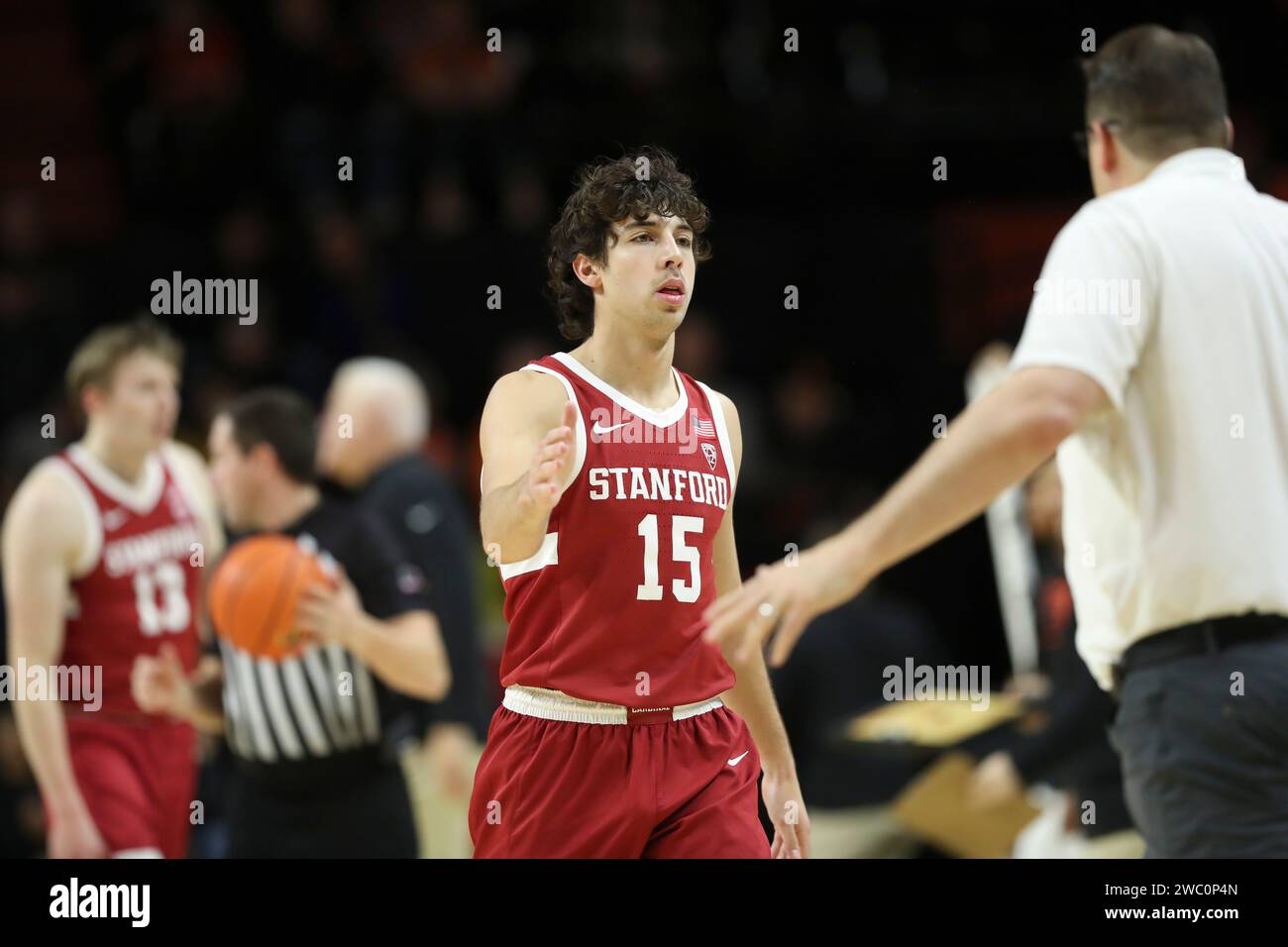 Stanford guard Benny Gealer (15) high fives head coach Jerod Haase ...