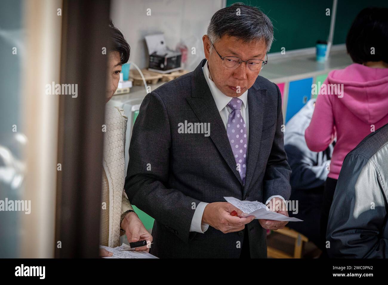 Taipei, Taiwan. 13th Jan, 2024. TPP Presidential Candidate Ko Wen-je and his wife Chen Pei-chi ...