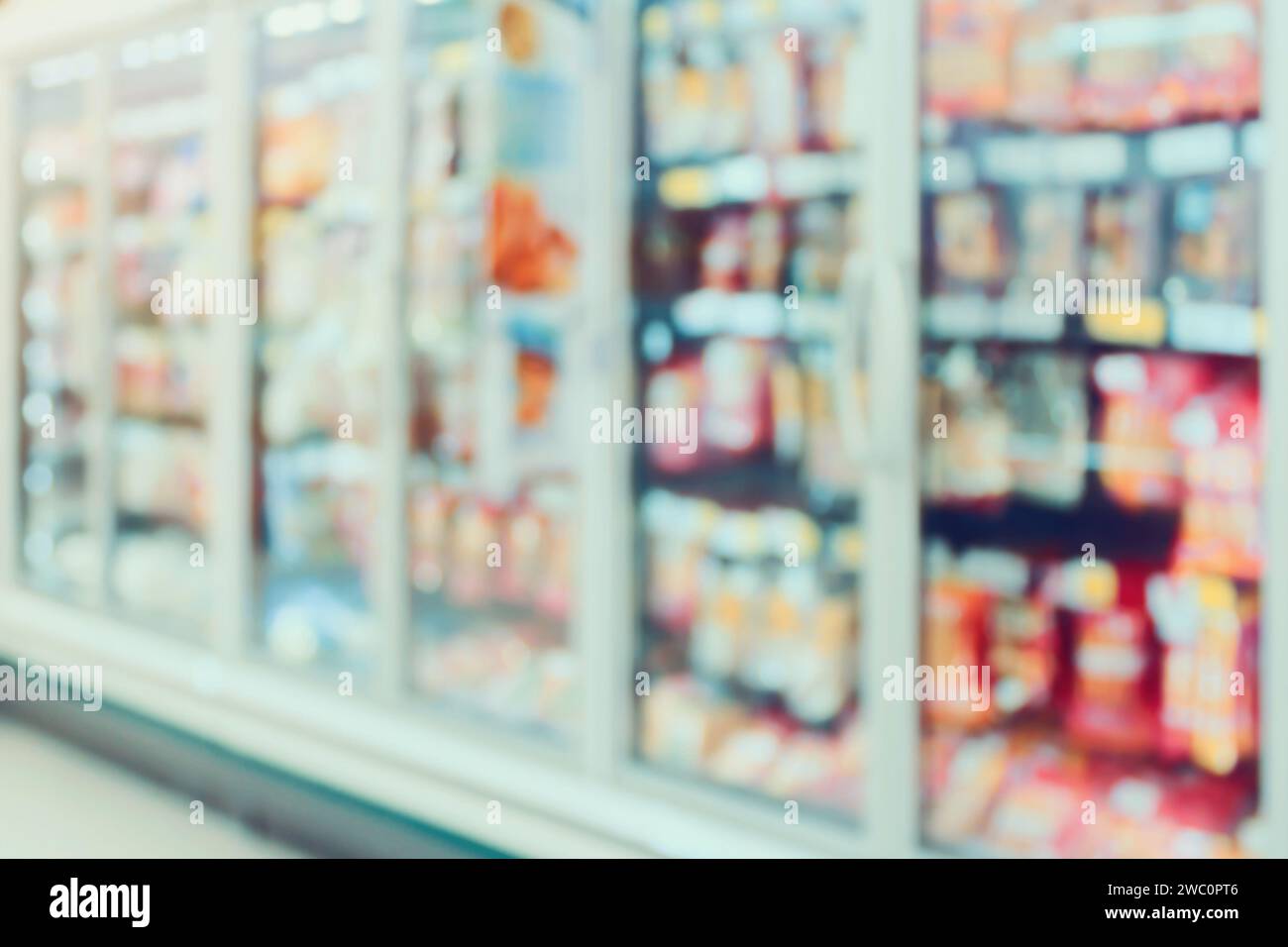Frozen food section in supermarket blurred background, vintage tone ...