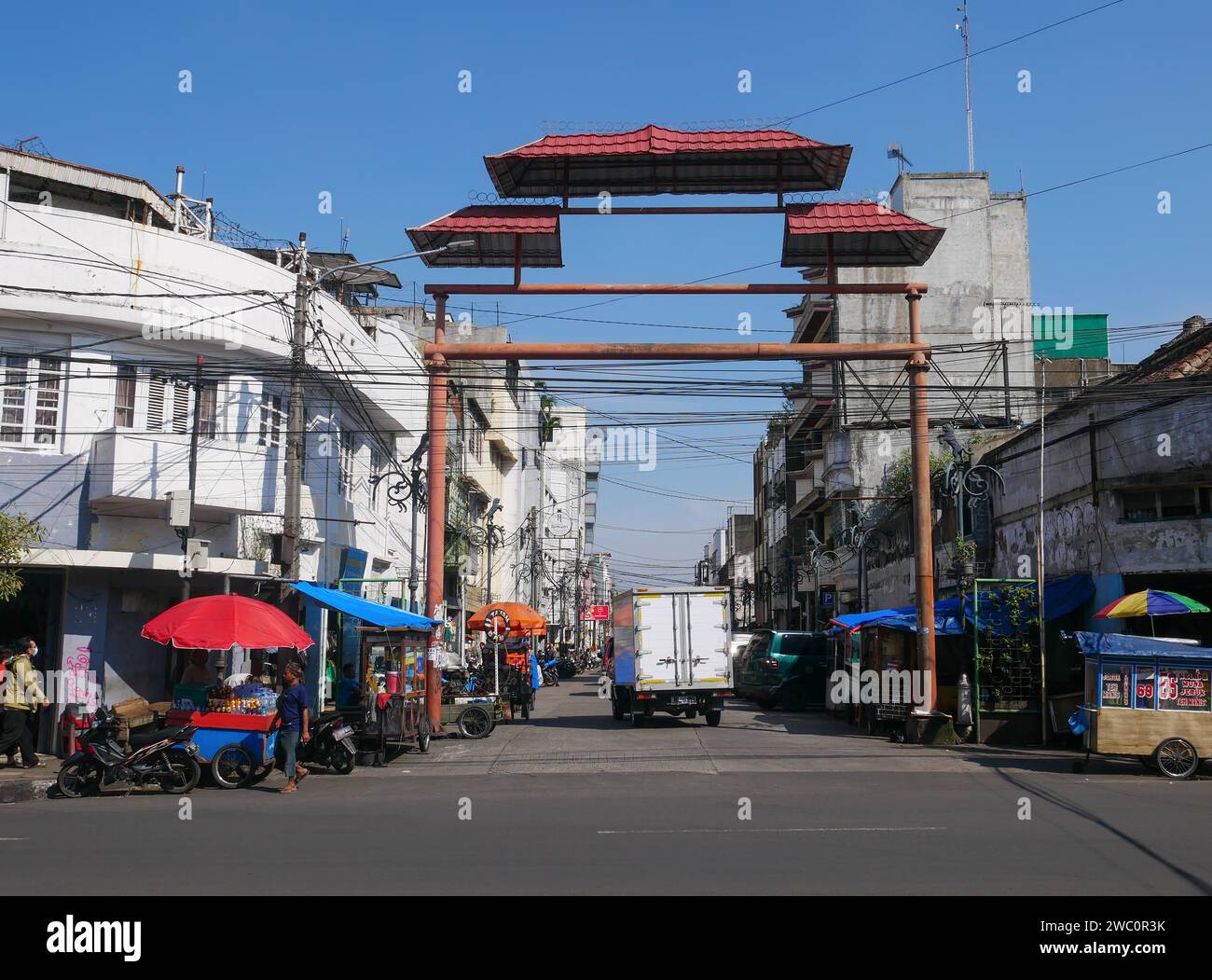 Entrance to Jl. Cipadak in downtown old Bandung, West Java, Indonesia ...