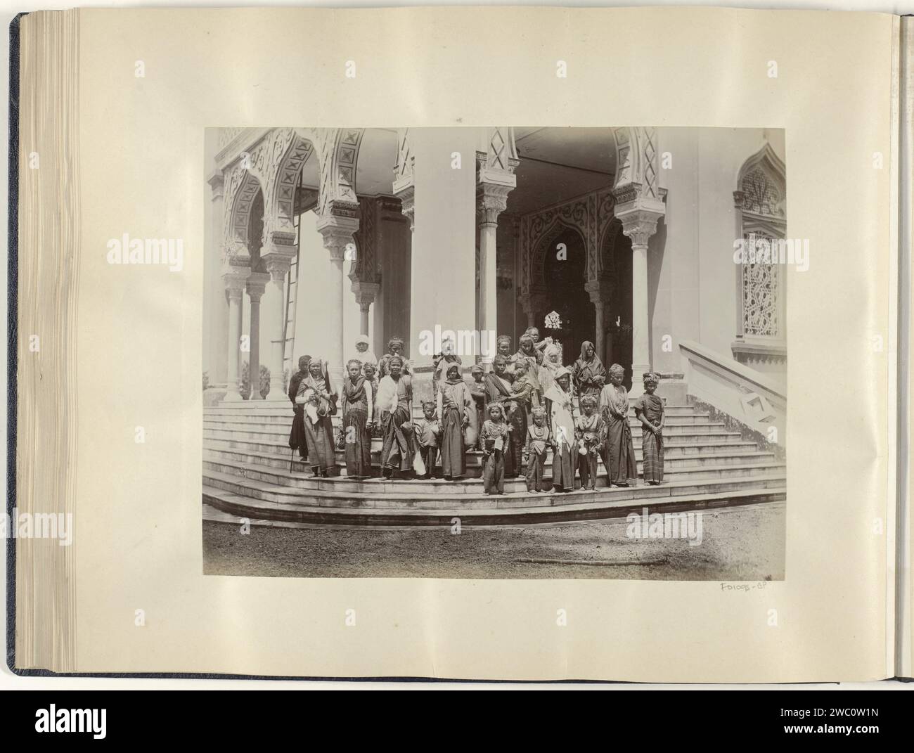 Group portrait of women and children on the stairs of the great mosque ...