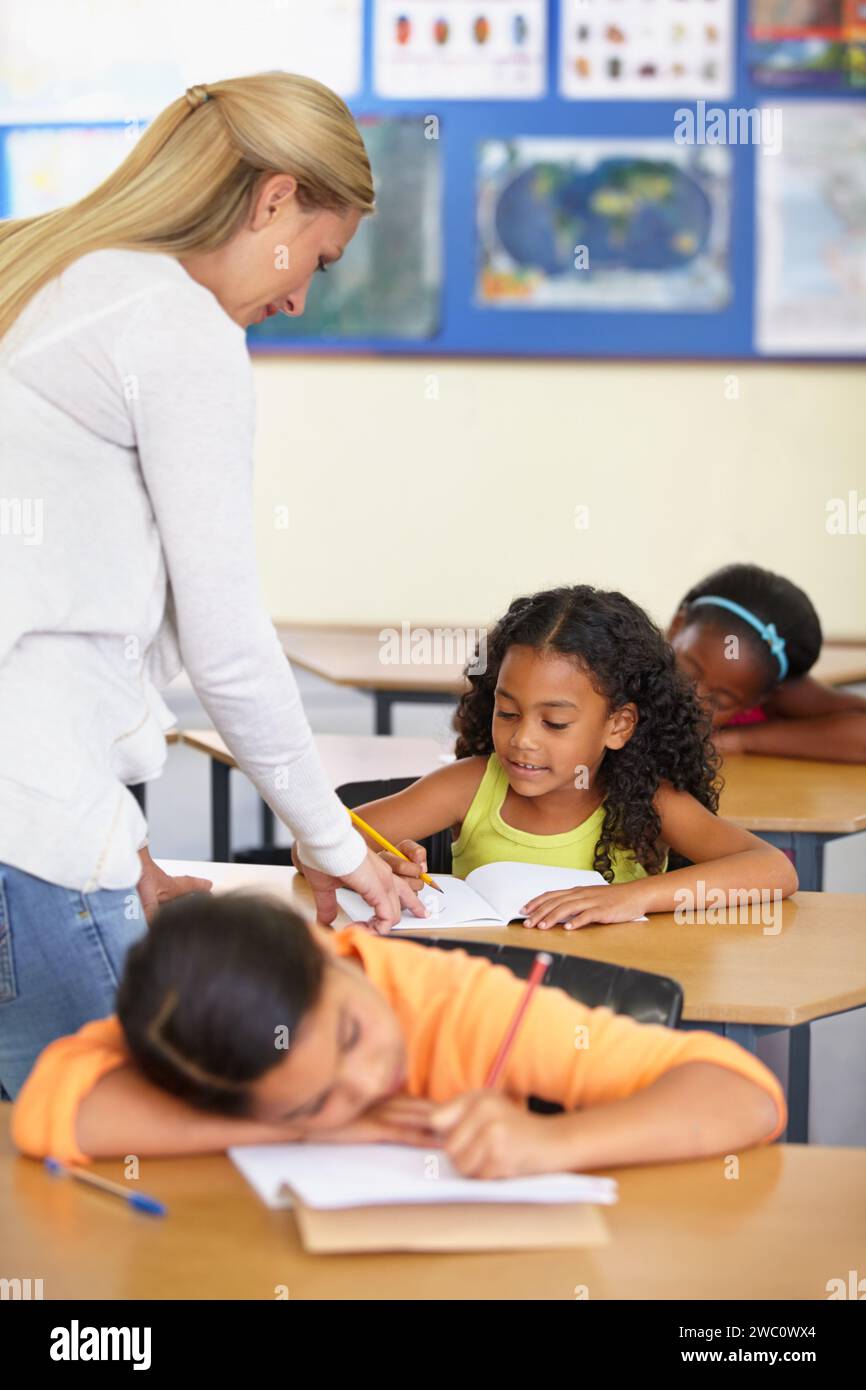 Teacher woman, girl and desk with book, question and support for education with knowledge in ...