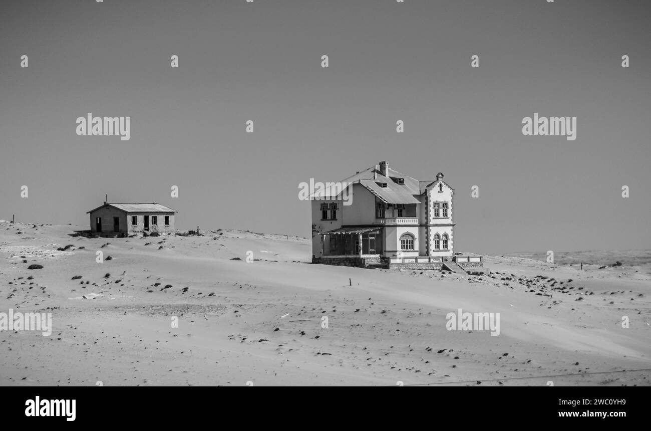 Some of the old abandonded houses of the Ghost town of Kolmanskop in ...