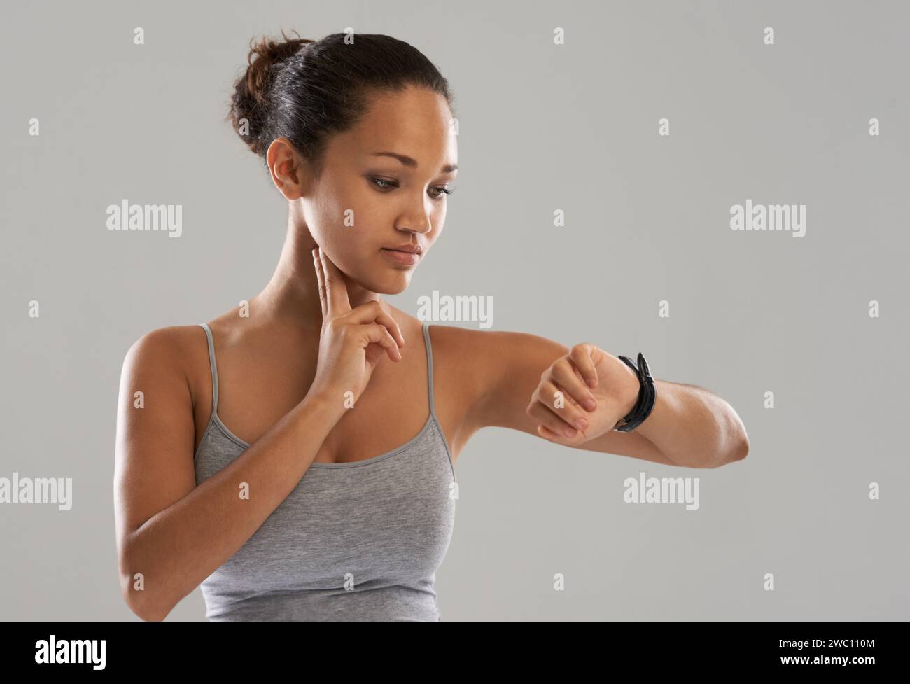 Woman, watch and checking pulse on neck for monitoring heartbeat ...