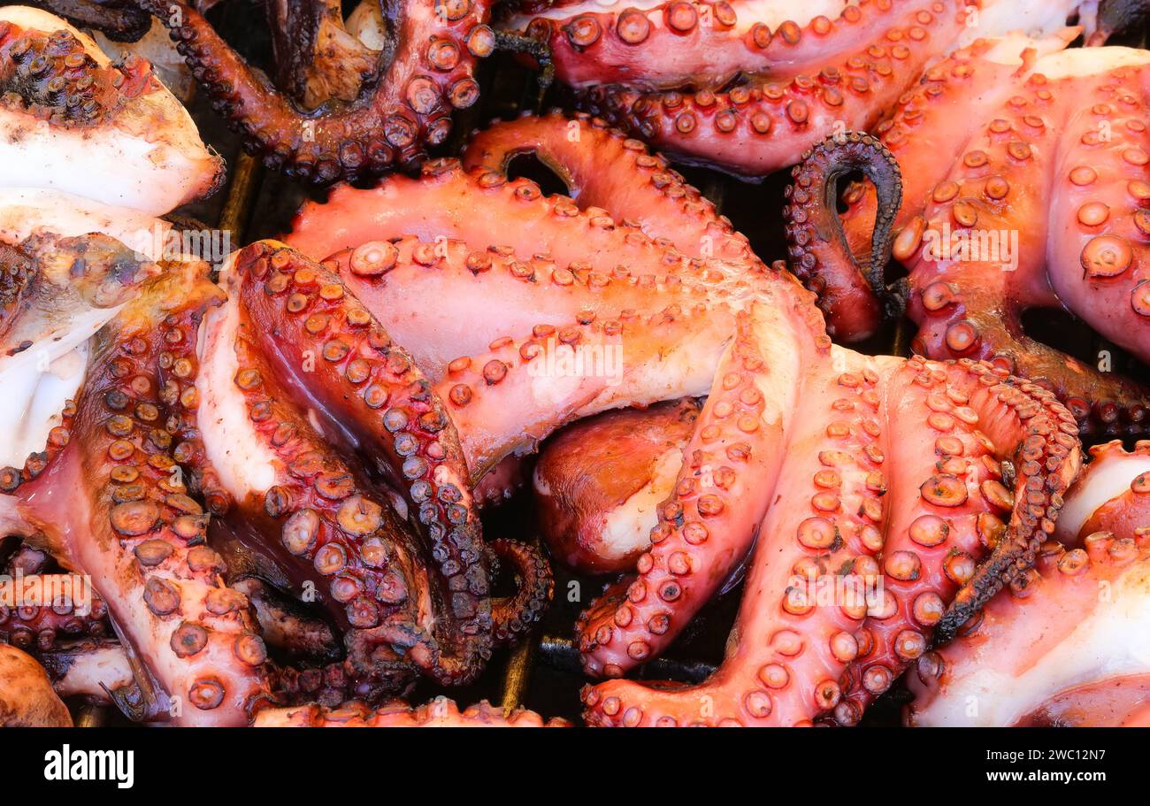 background cooked grilled octopus in the restaurant specializing in ...