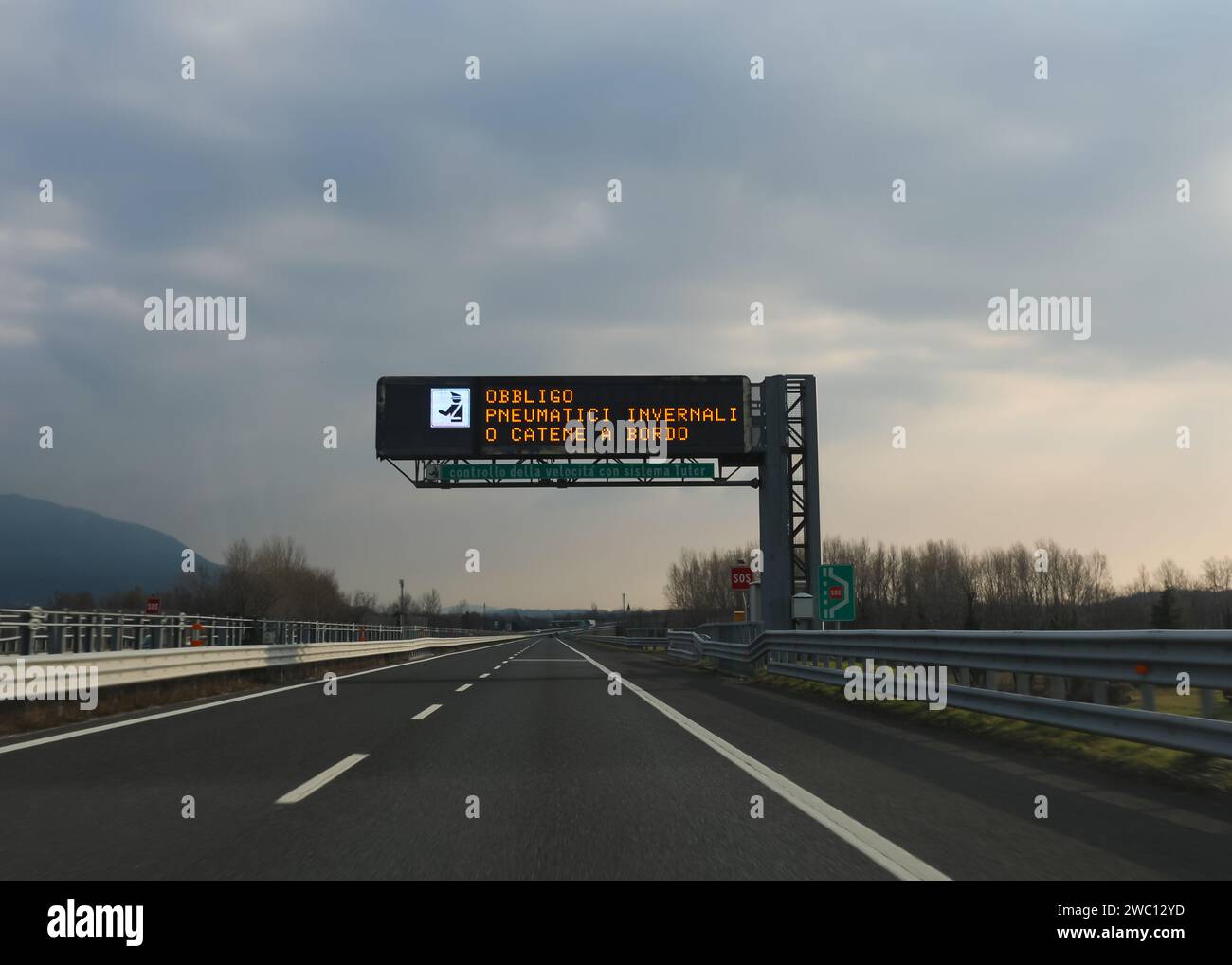 portal gate with motorway sign indicating that it is mandatory to have ...