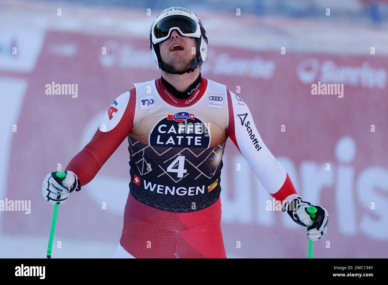 Austria's Otmar Striedinger reacts after completing an alpine ski, men ...