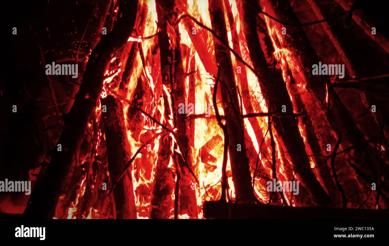 Huge fire at night timber crib fascinating and mesmerizing, primal ...