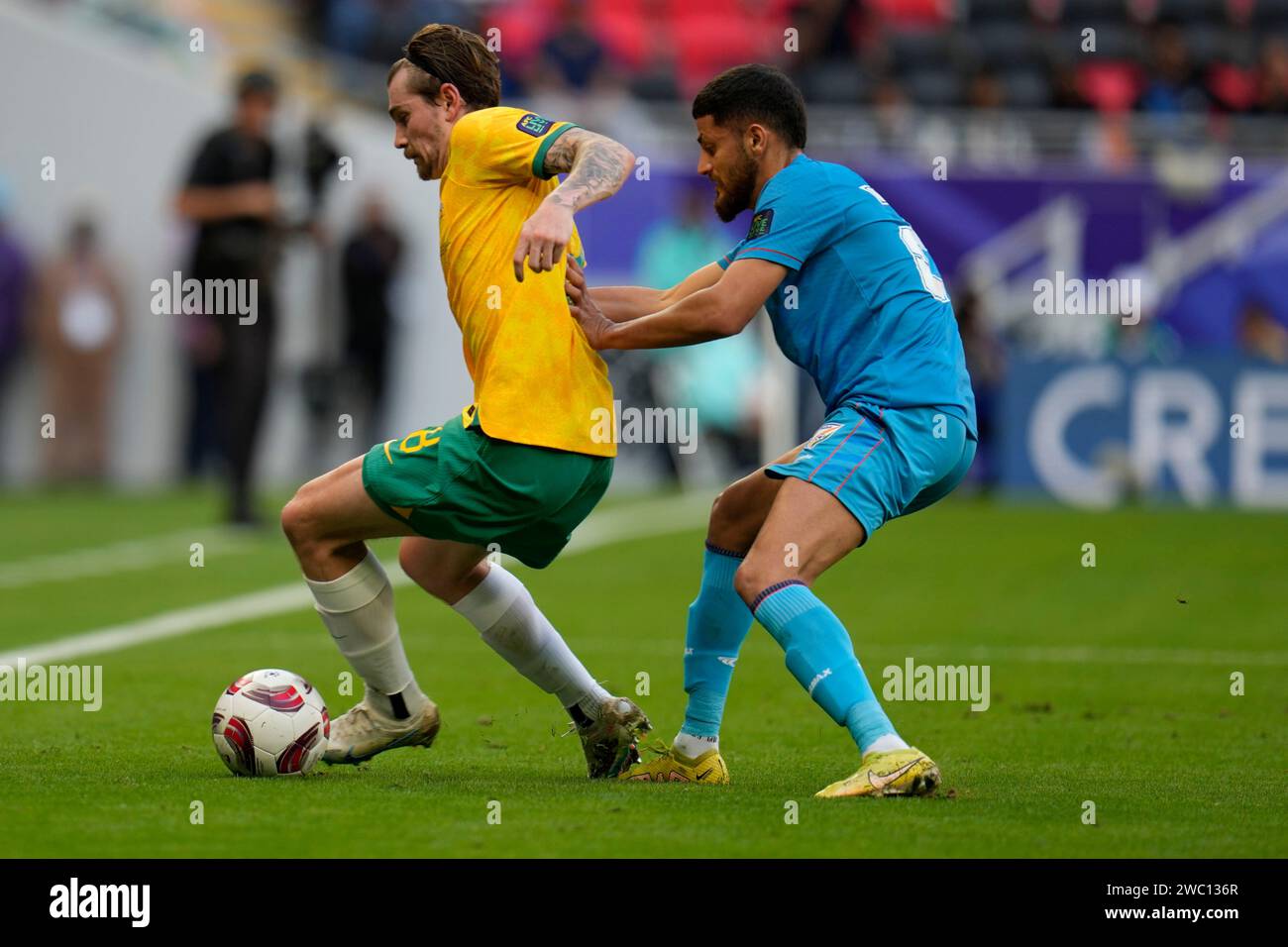 India's Deepak Tangri, right, tries to stop Australia's Connor Metcalfe ...