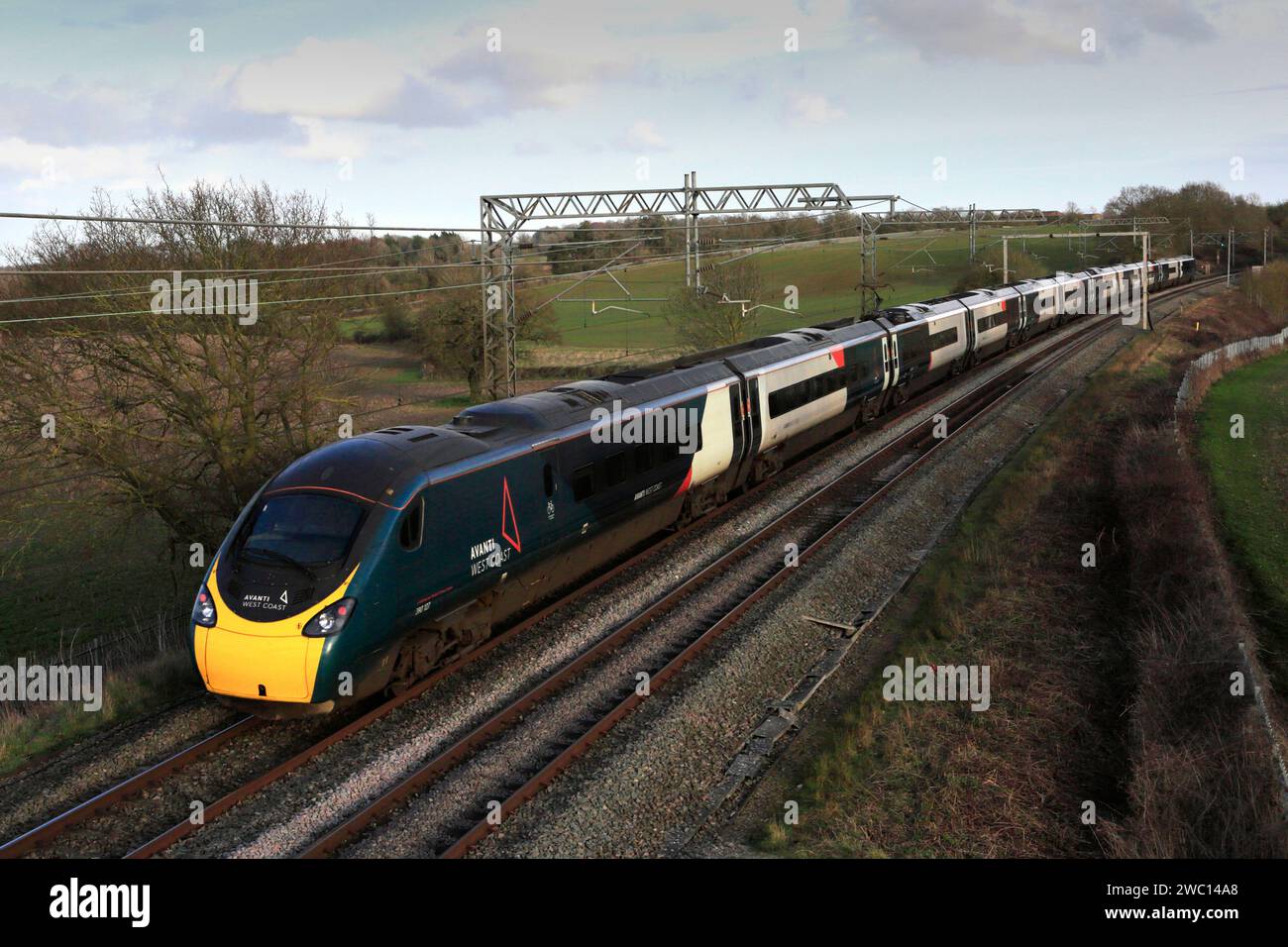 A Pendalino class 390, Avanti West Coast train near Blisworth village ...
