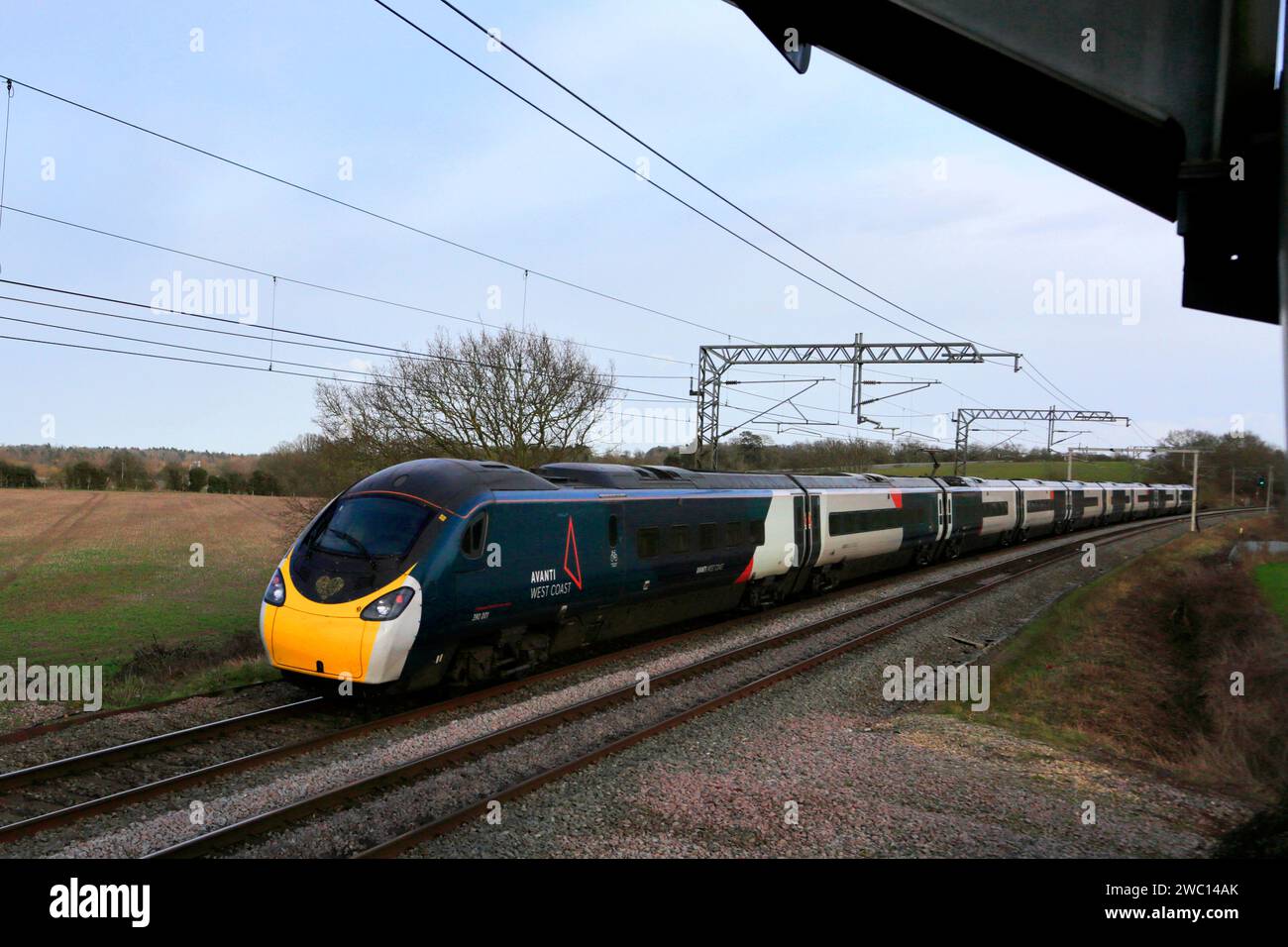 A Pendalino class 390, Avanti West Coast train near Blisworth village ...