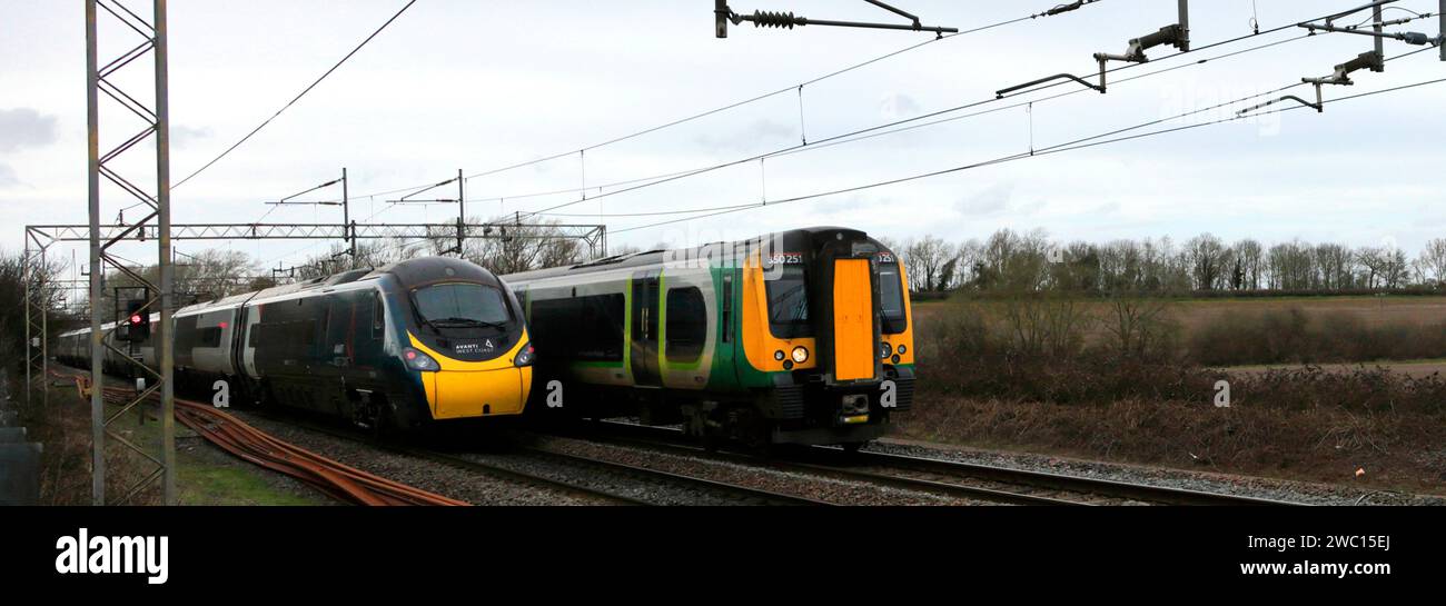 London Northwestern 350 class train near Blisworth village, Northamptonshire, England. On the ...
