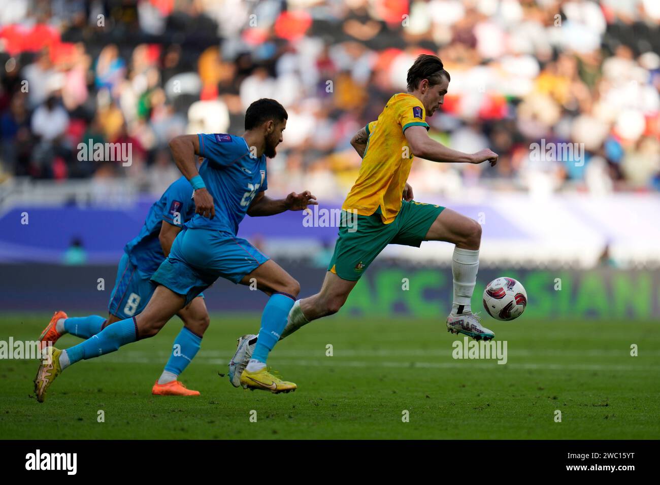 Australia's Connor Metcalfe, right, goes for the ball as India's Deepak ...