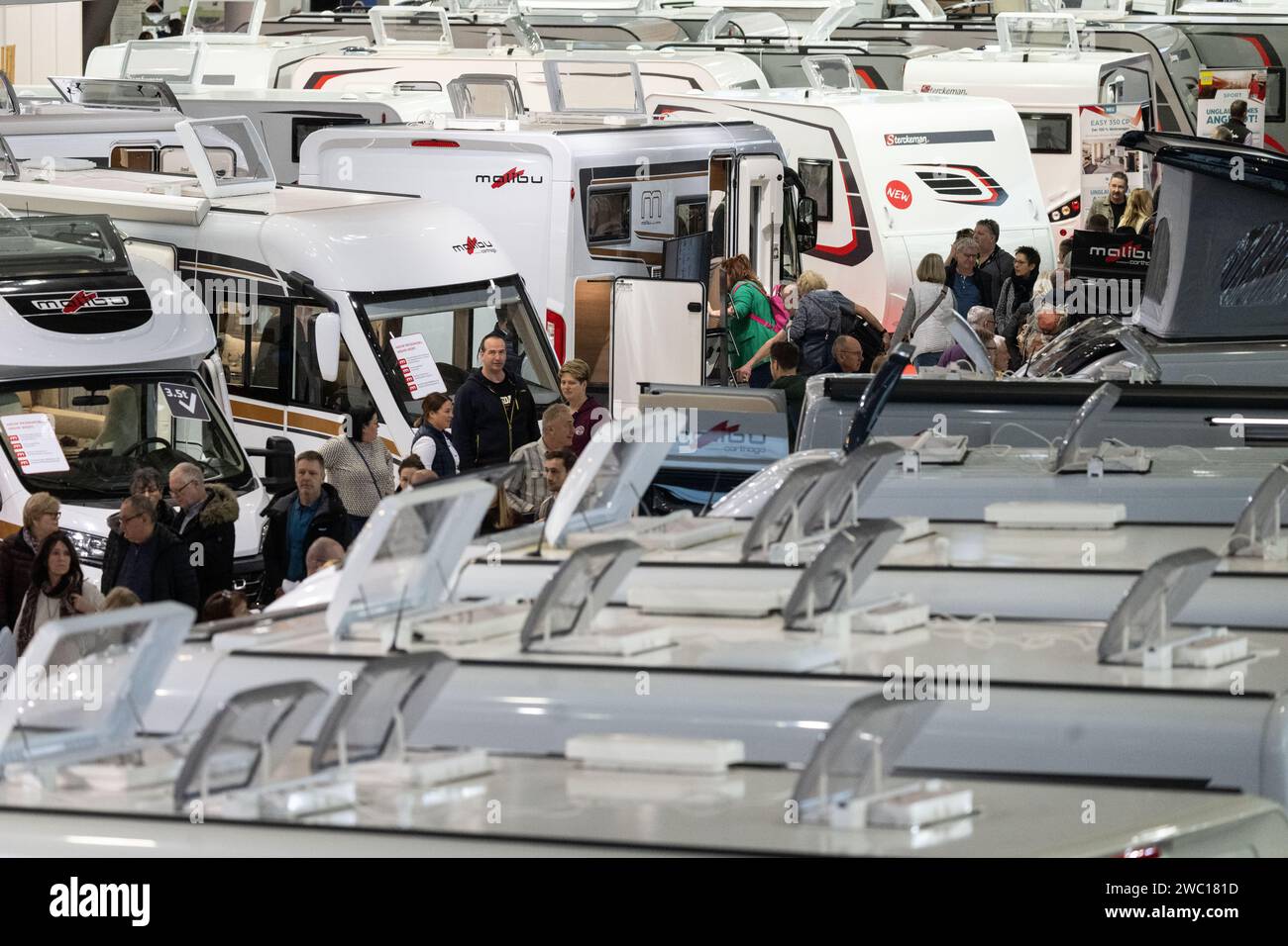 Stuttgart, Germany. 13th Jan, 2024. Motorhomes stand in a hall at the ...