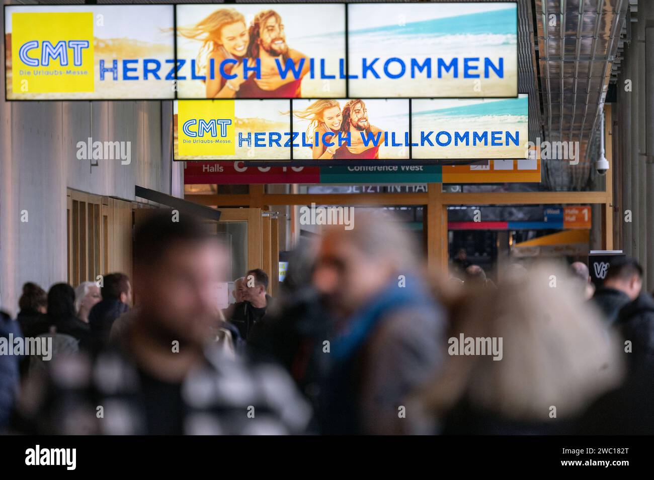 Stuttgart, Germany. 13th Jan, 2024. Visitors walk through an aisle ...
