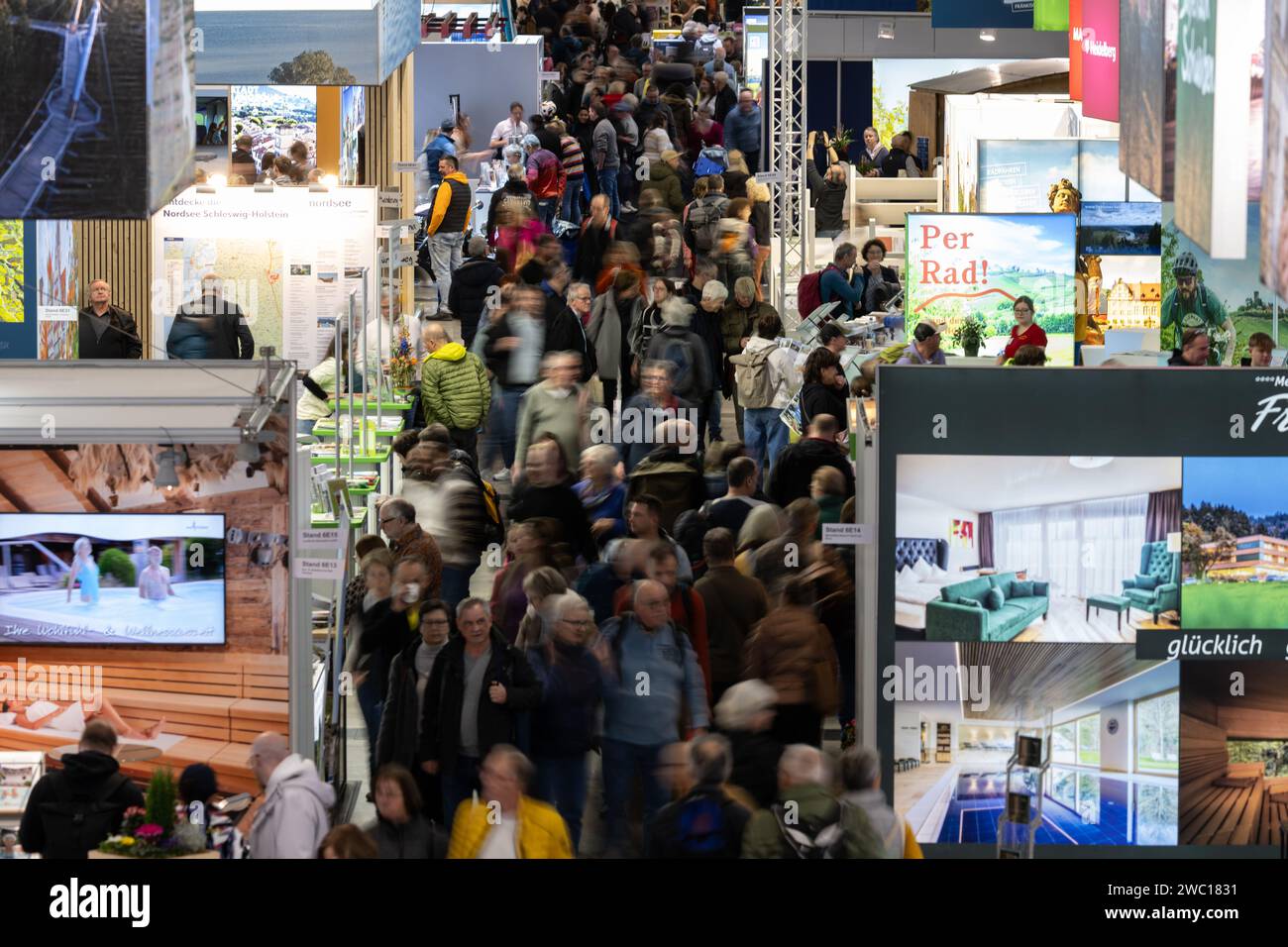 Stuttgart, Germany. 13th Jan, 2024. Visitors walk through a hall at the ...