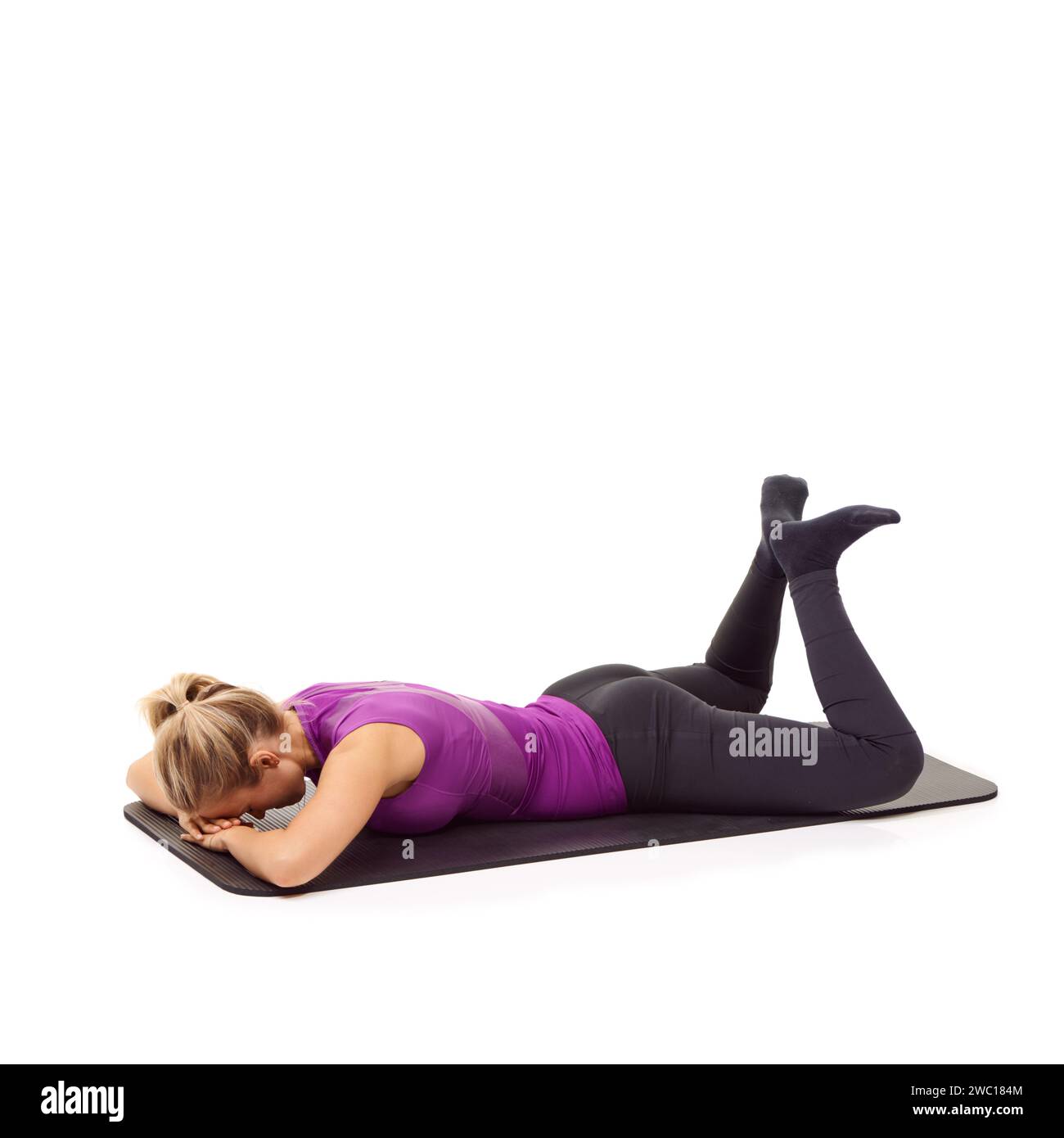 Yoga, woman and stretching legs on the floor in white background, mock ...