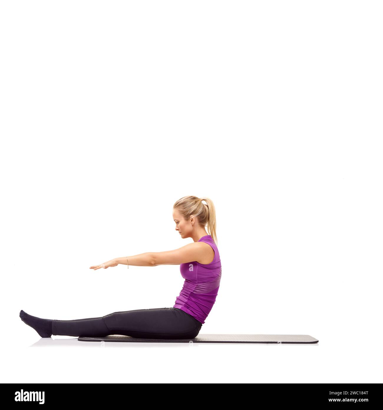 Woman, stretching or exercise on mat in studio for fitness, workout or ...