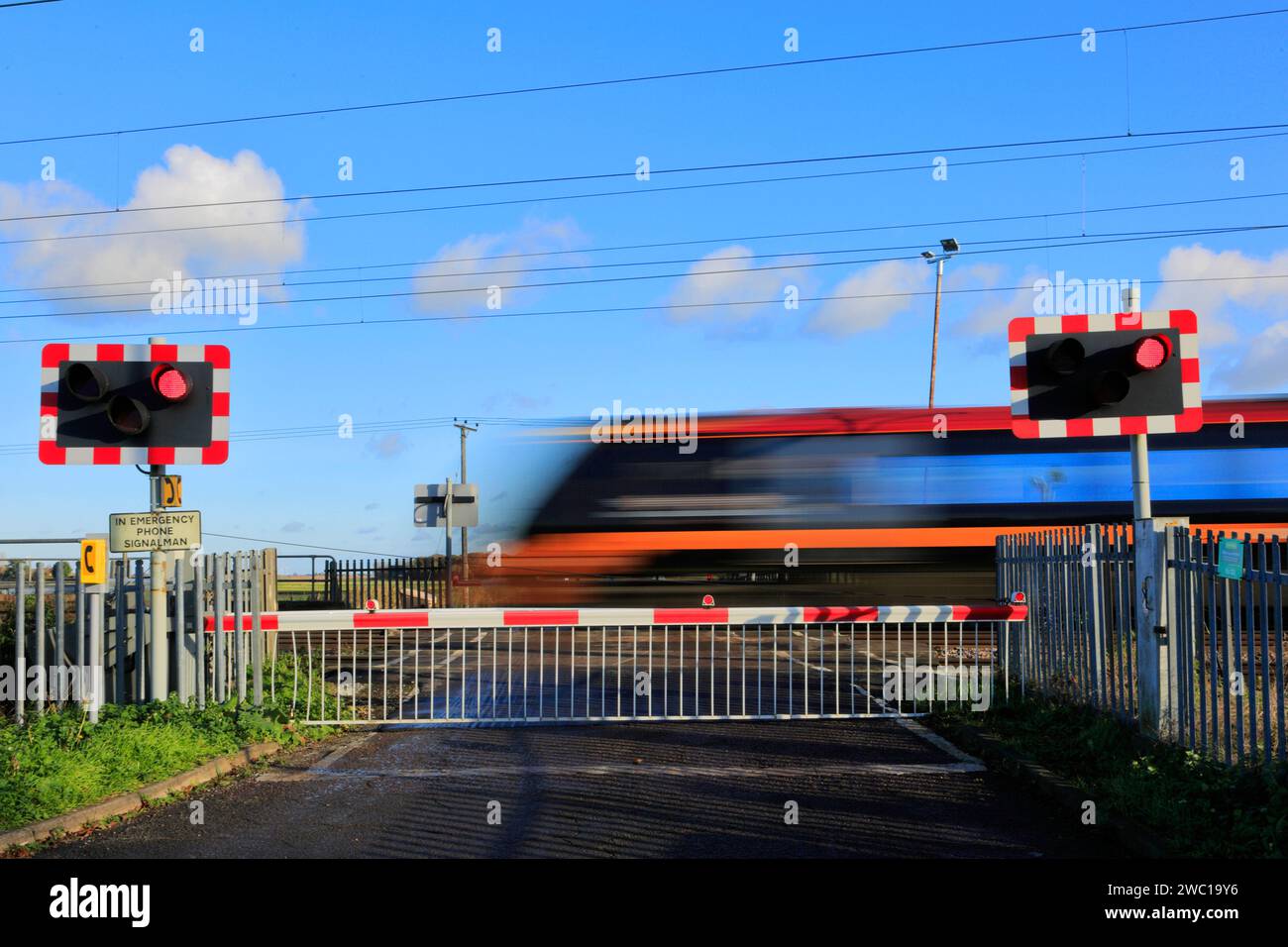 Grand Central Trains passing Holme unmanned crossing, East Coast Main Line Railway ...