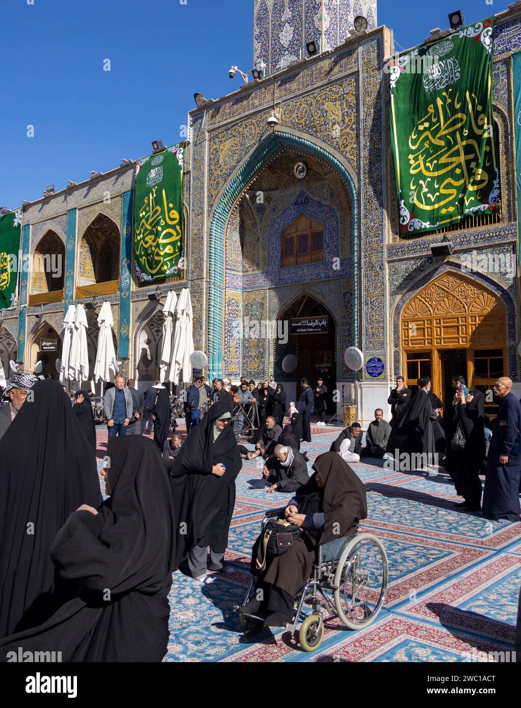 Pilgrims in the courtyard of the Shrine of Imam Husayn, Najaf, Iraq ...
