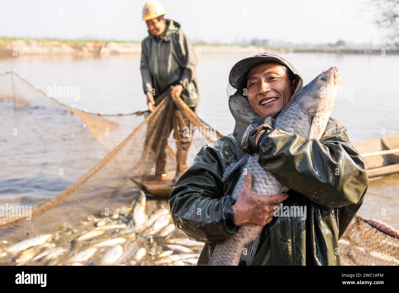 Changsha, China's Hunan Province. 13th Jan, 2024. A fisherman shows a ...