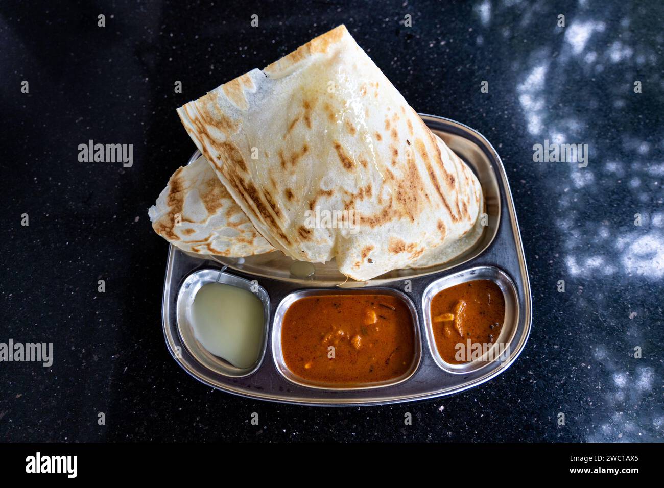 Roti Tisu or Tissue Bread is crunchy form of bread served at mamak ...