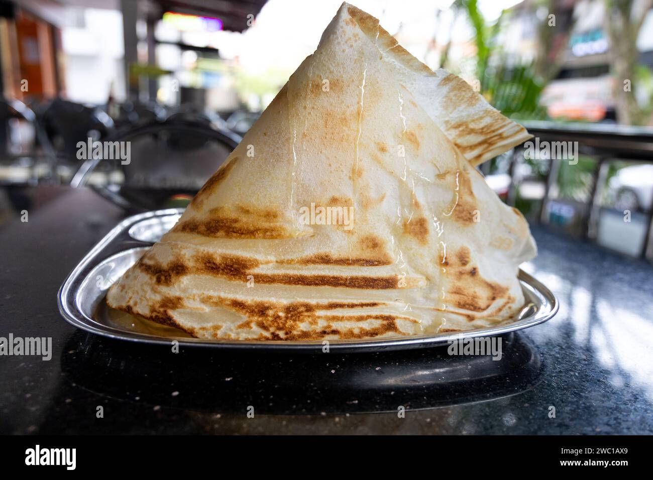Roti Tisu or Tissue Bread is crunchy form of bread served at mamak ...