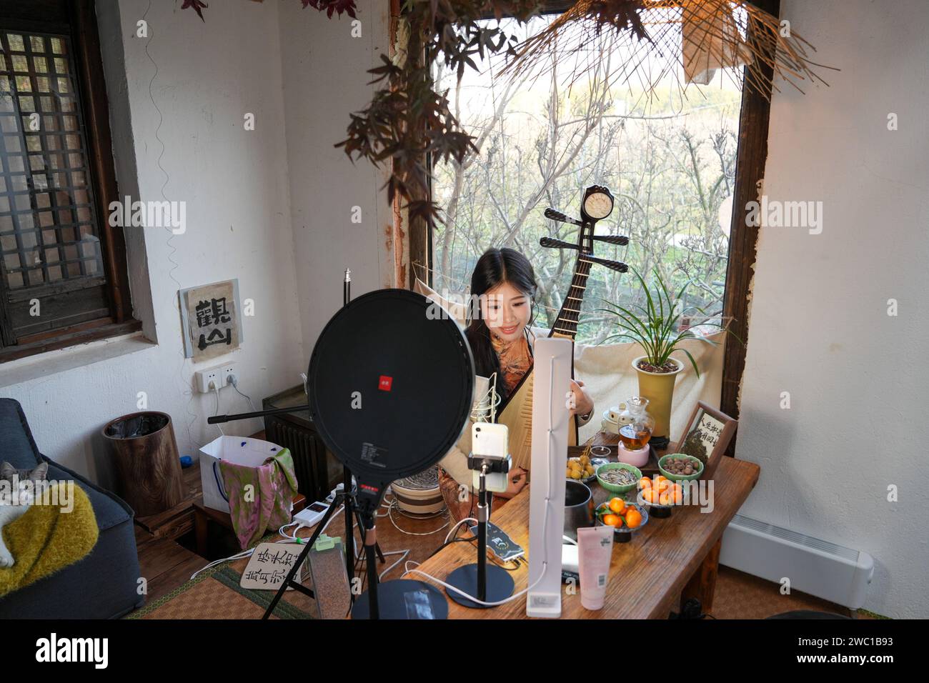 Nanjing, China's Jiangsu Province. 11th Jan, 2024. A host gives a ...