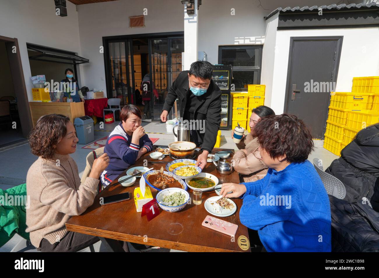 Nanjing, China's Jiangsu Province. 11th Jan, 2024. Liu Yuelong (3rd L ...