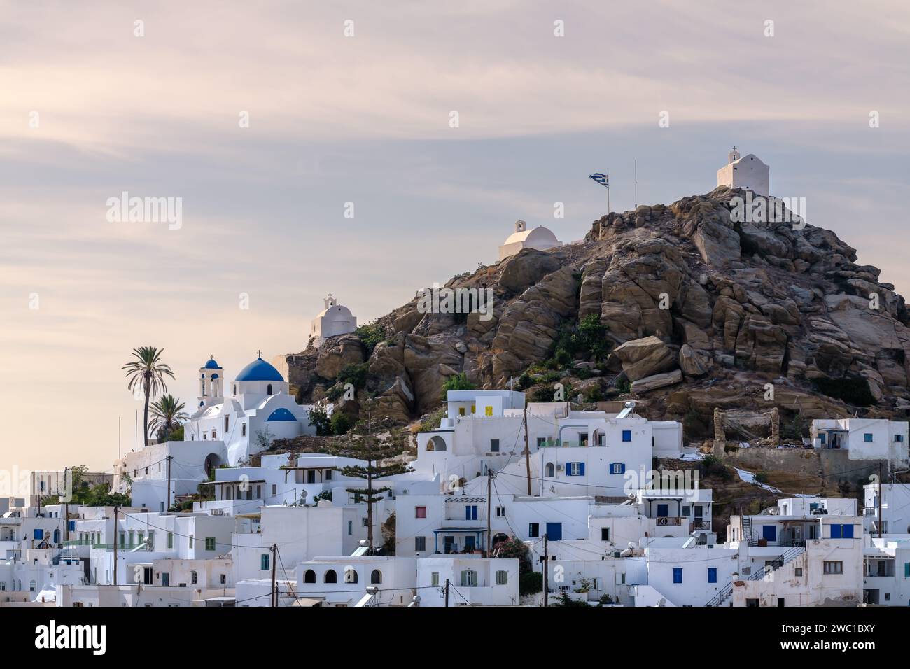 Panoramic view of the beautiful whitewashed village of Ios in Greece ...