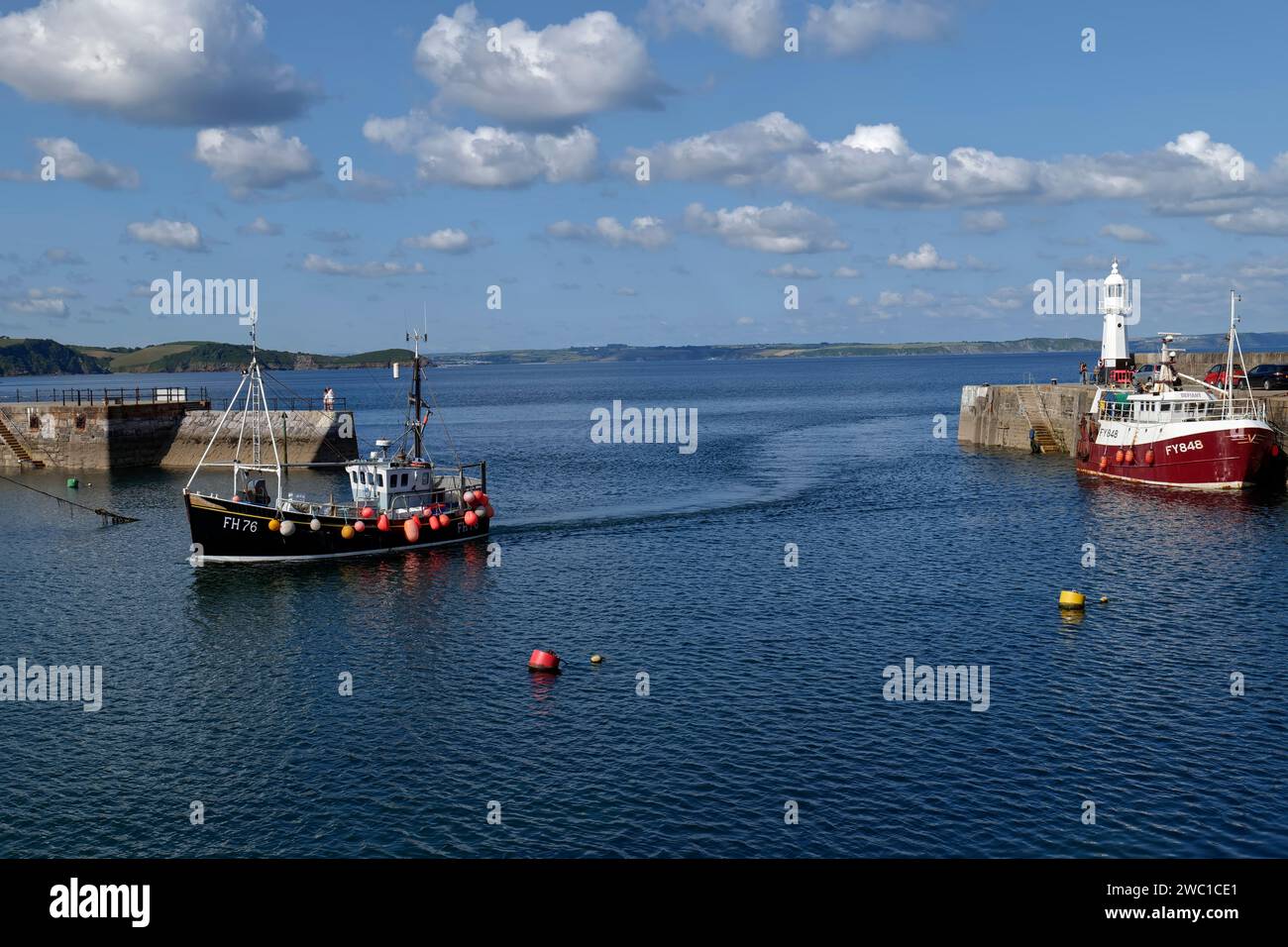 fishing boat Galwad-y-mor FH76 enters the harbour at Mevagissey ...