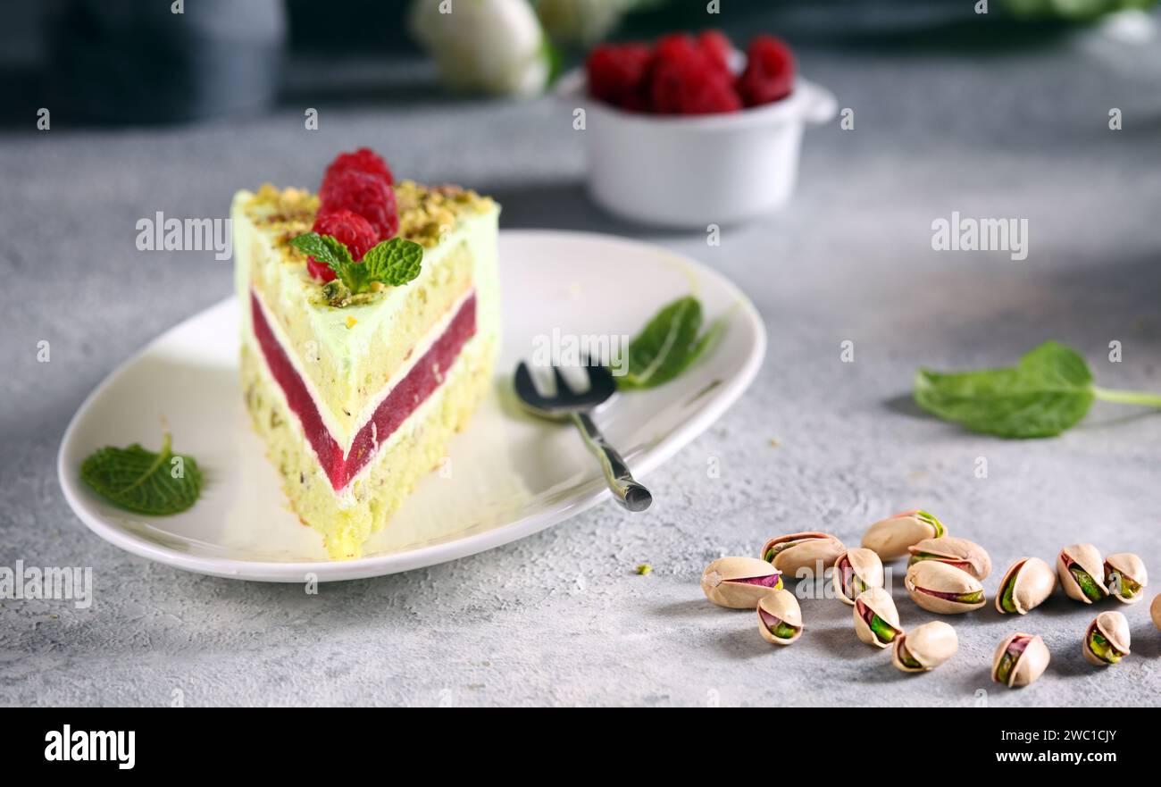 Cake raspberries pistachios dessert hi-res stock photography and images ...