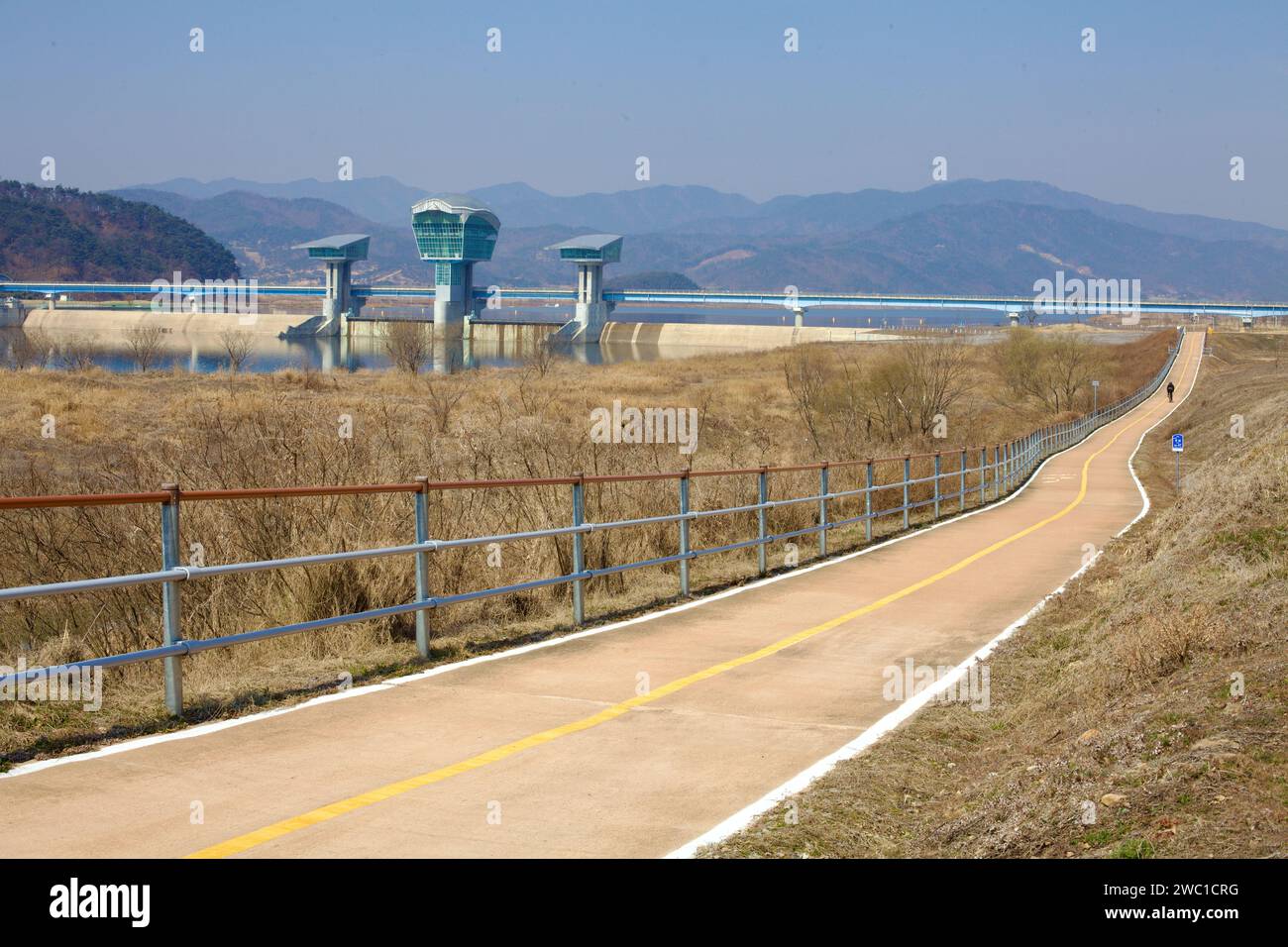 Cyclist biking long natural path hi-res stock photography and images ...
