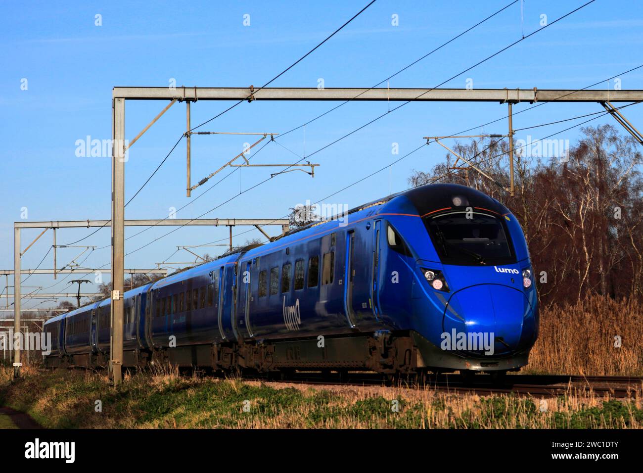 Lumo trains 803001 train, East Coast Main Line near Peterborough City ...