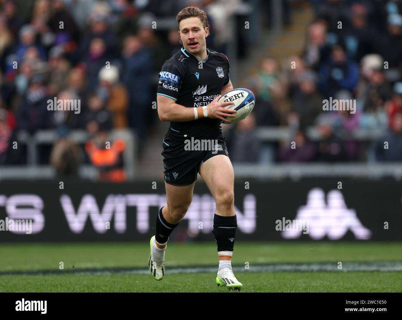 Glasgow Warriors' Kyle Rowe scores their side's first try of the game ...